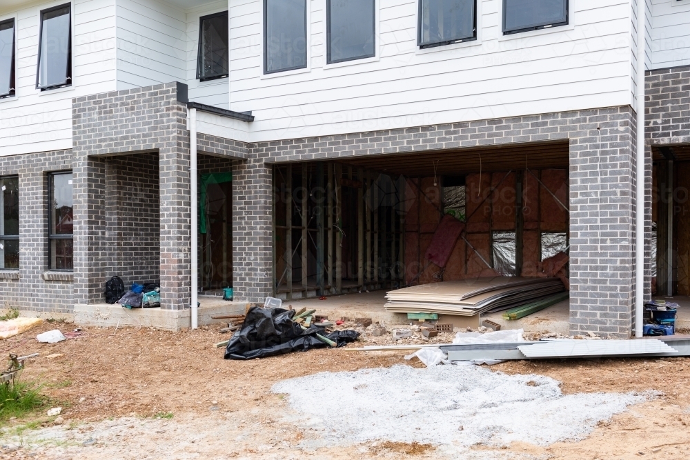Image of Two storey house building under construction - Austockphoto