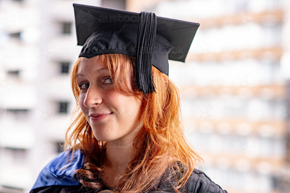 Image of university student at graduation - Austockphoto