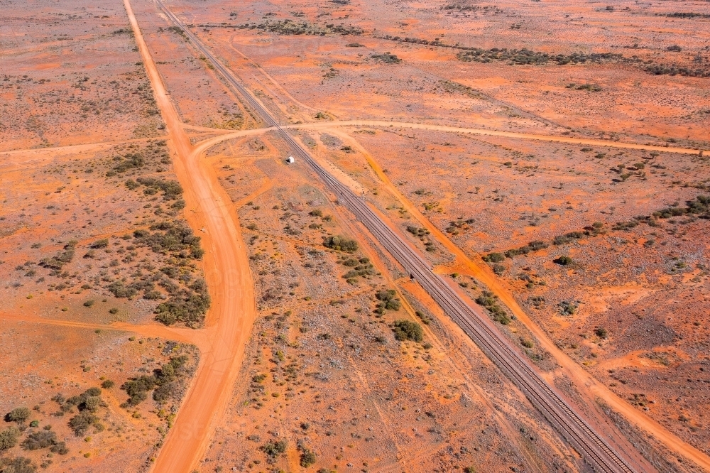 Image of unsealed road beside the Trans Australian railway line in ...