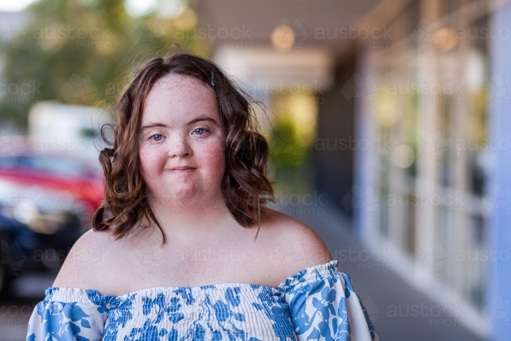 Image of Urban portrait of aussie teen with down syndrome outside ...