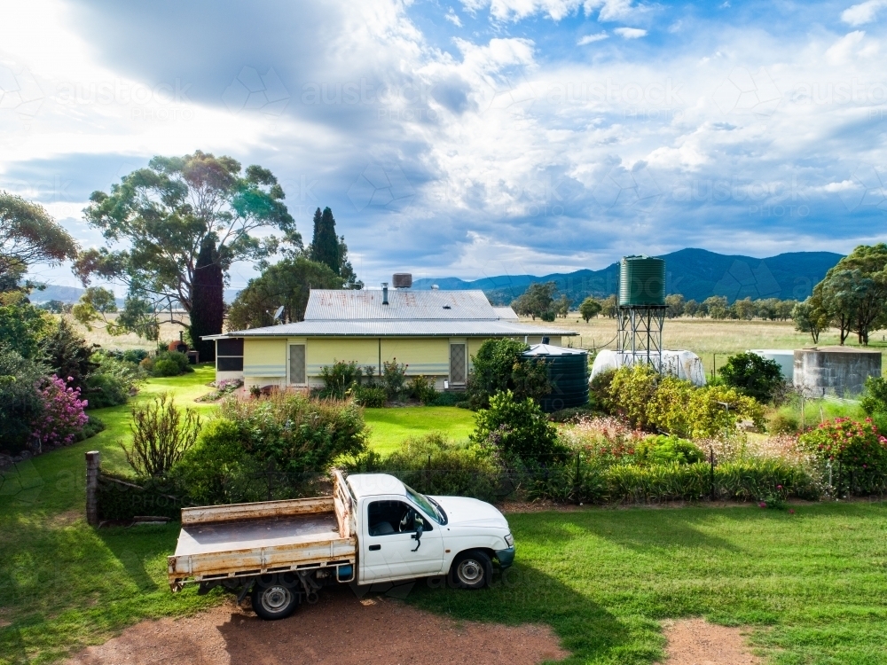 Image of Ute parked outside of farmhouse on rural country property in ...