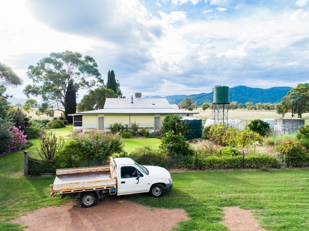 Image of Ute parked outside of farmhouse on rural country property in ...
