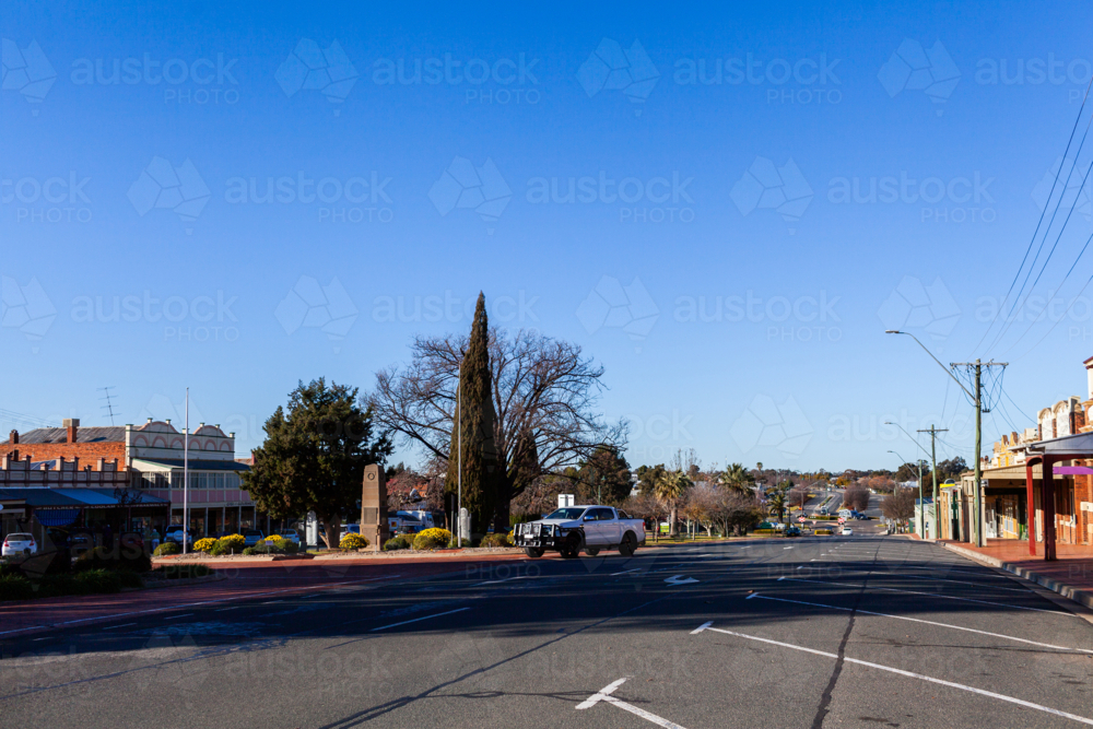 Image of Ute turning across main street in rural country town in ...