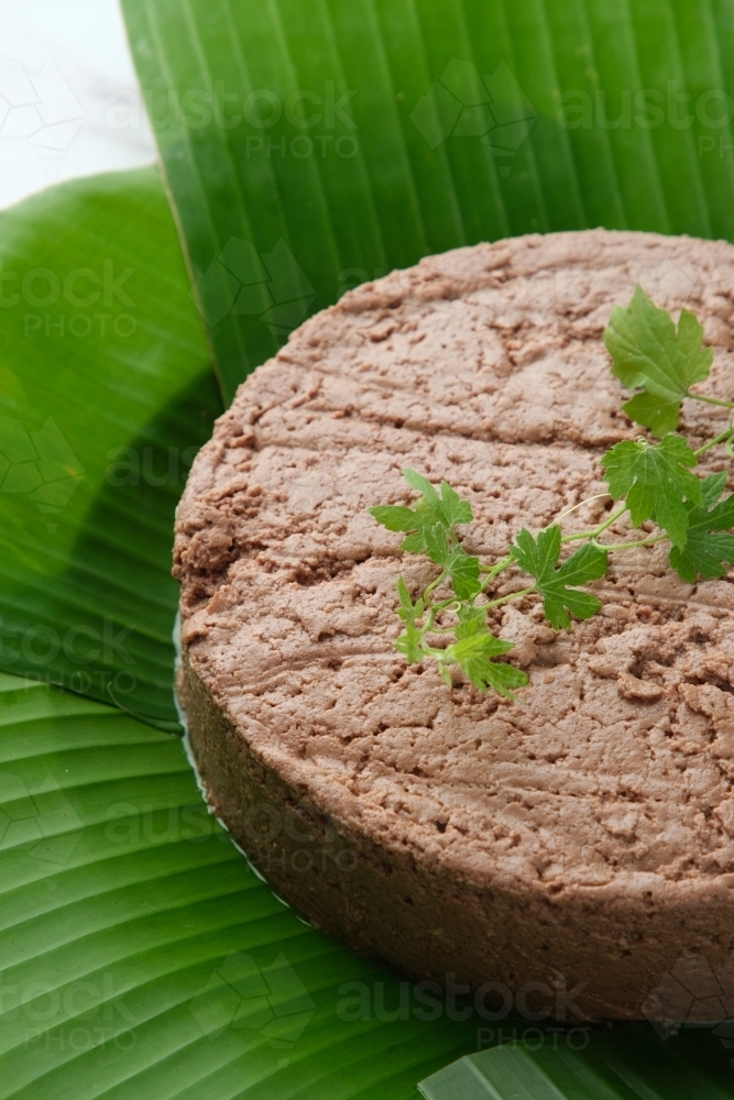 Image of Vietnamese liver pate served in a banana leaf topped with an ...