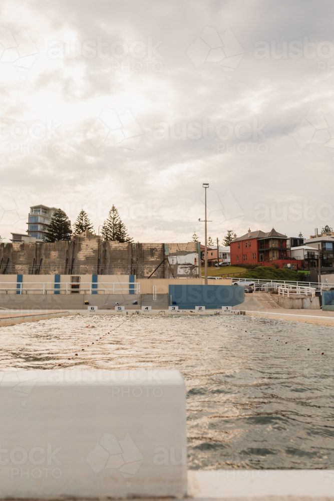 Image of View across the water of the Newcastle Ocean Baths pool ...