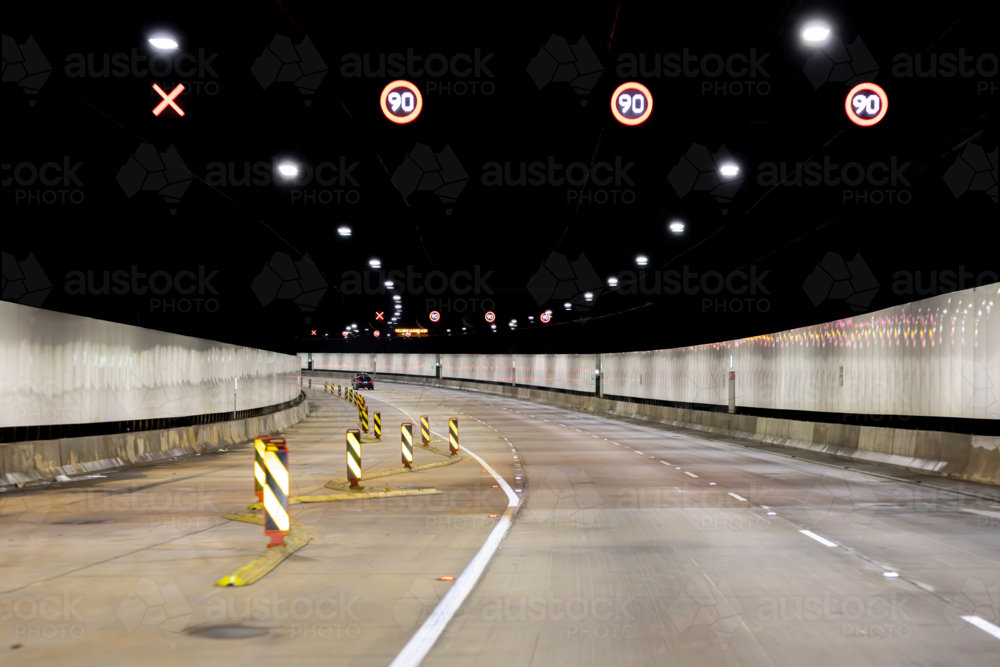 Image of View from a car, Sydney toll road tunnel showing speed signs ...