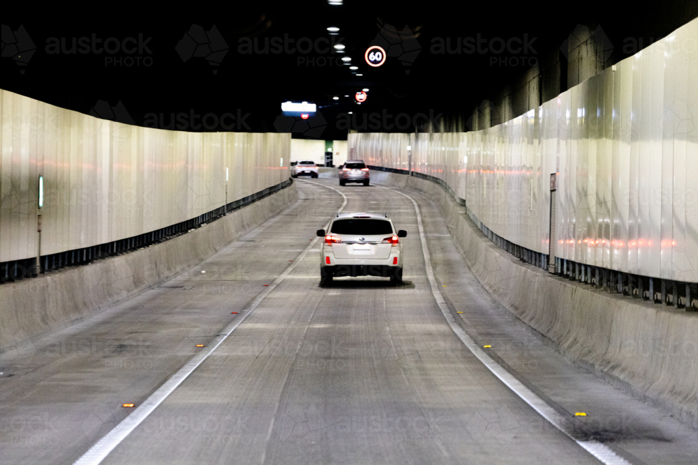 Image of View from a car, Sydney toll road tunnel showing speed signs ...