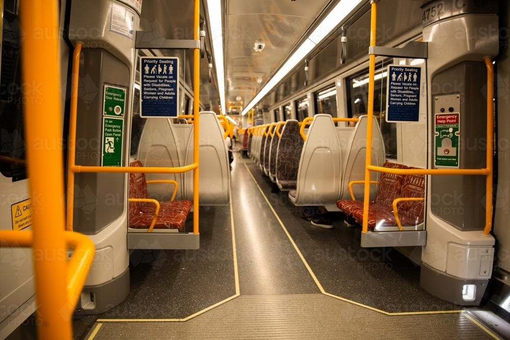 Image of view inside a train carriage at night in Brisbane - Austockphoto