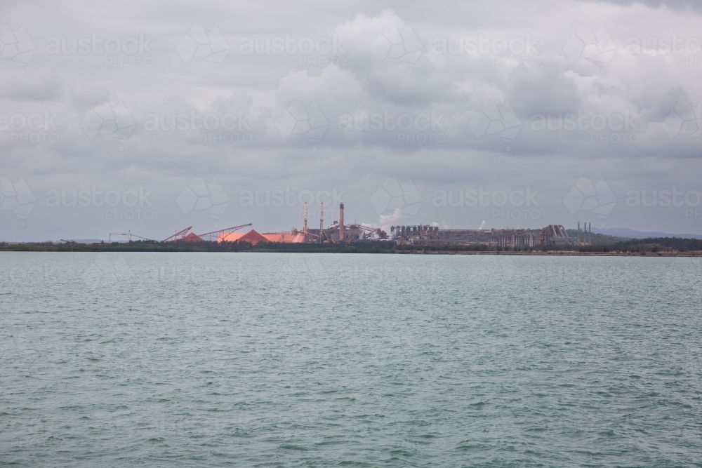 Image of view of Gladstone Port industry from the water - Austockphoto