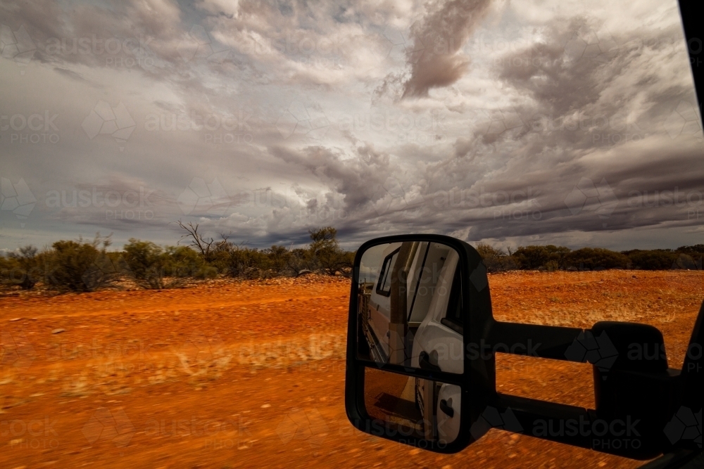 Image of View out a car window of desert country with dramatic stormy ...