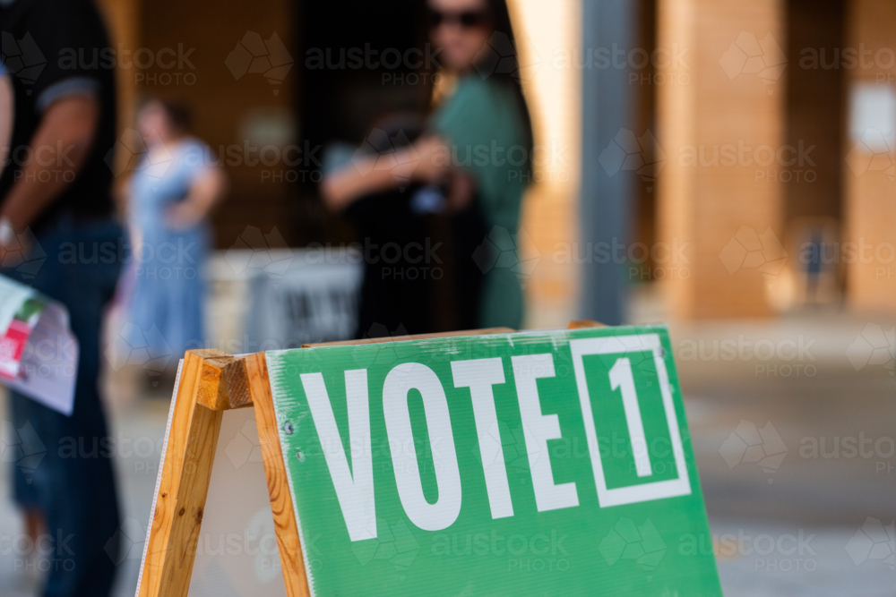 Image of Vote 1 political signage on way to polling station - Austockphoto