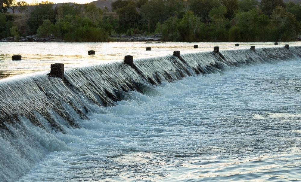 Image of water cascading over the roadway at Ivanhoe Crossing near ...