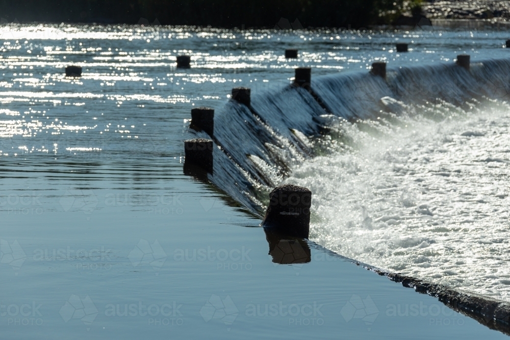 Image of water flowing over the Ivanhoe River Crossing near Kununurra ...