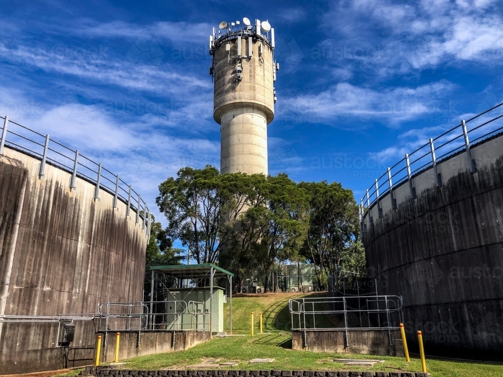 Image of Water tower and two large concrete water tanks. - Austockphoto