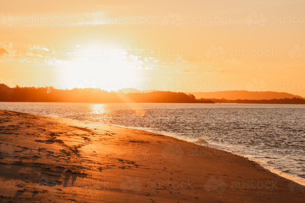 Image of Whiting Beach, Yamba at sunset - Austockphoto