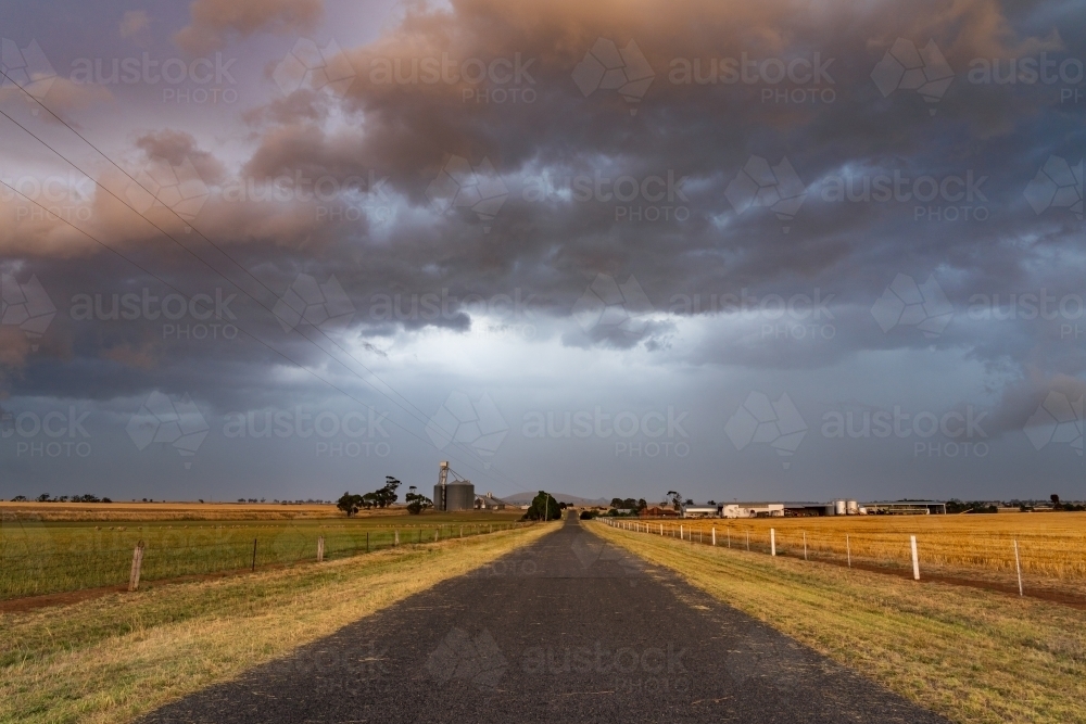 Image of Wide angled view of a colourful dramatic stormfront over a ...