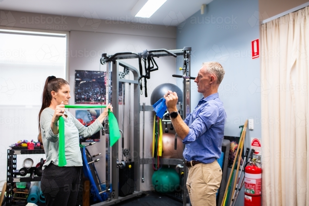 Image of Woman working with physio at physiotherapist clinic using ...