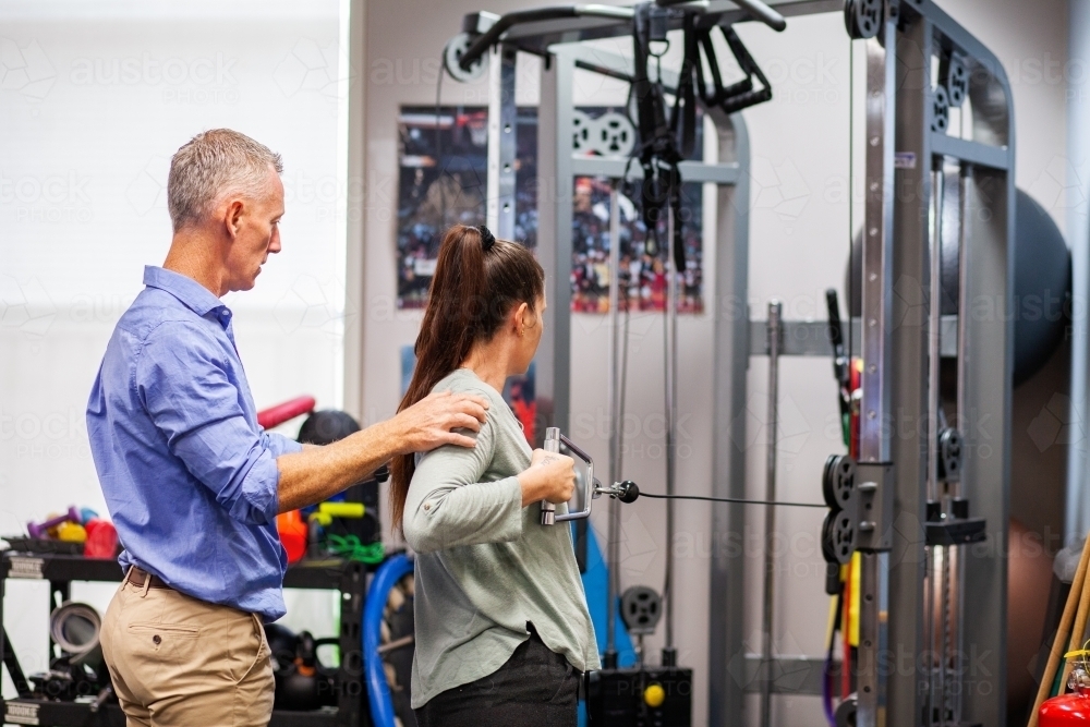 Image of Woman working with physio at physiotherapist clinic using ...