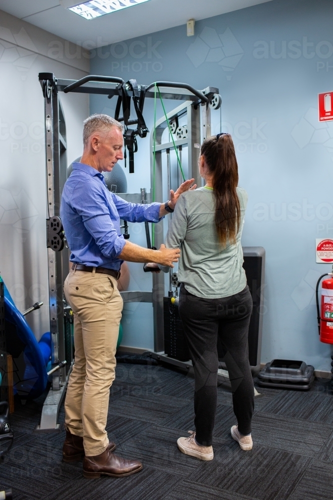 Image of Woman working with physio at physiotherapist clinic using ...