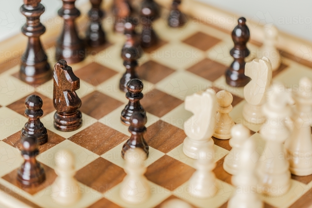 Image of Wooden chess pieces set up on board game indoors gameplay ...