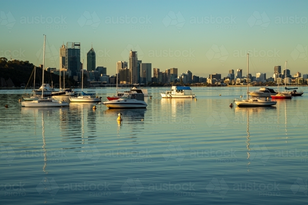 Image of Yacht reflection on bay with downtown Perth in background ...