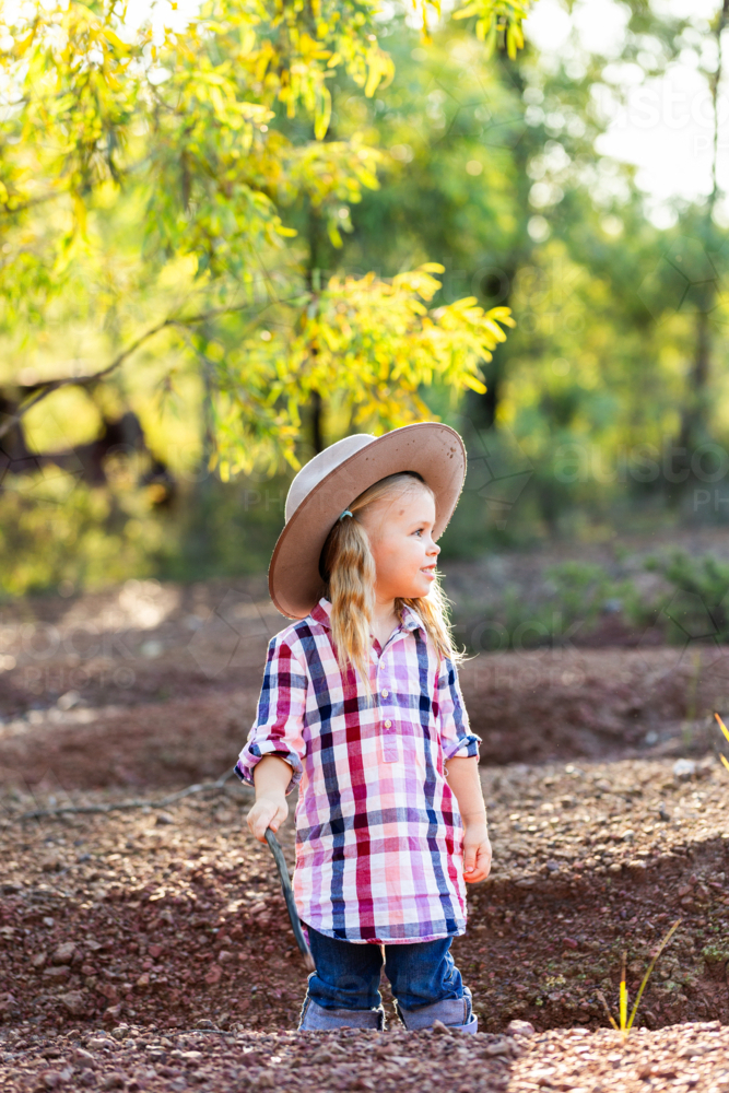 Image of Young aussie kid exploring Australian bushland in late summer ...