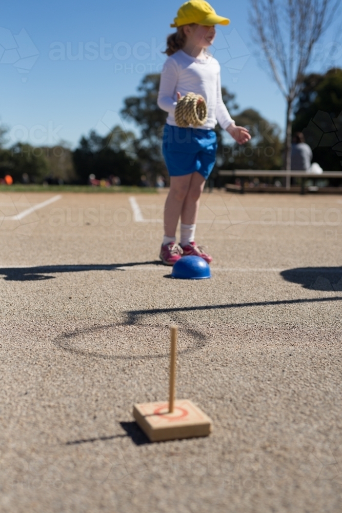 Image of Young girl playing quoits - Austockphoto