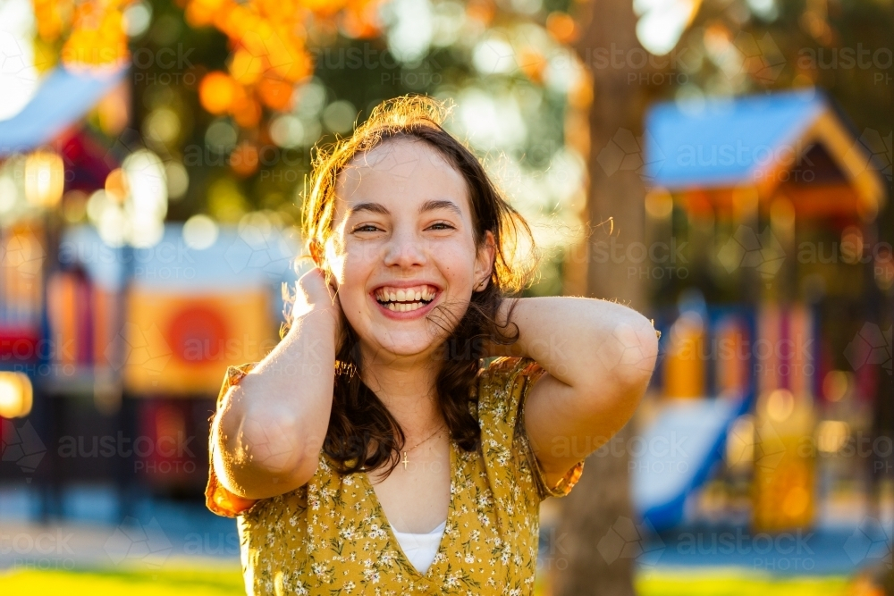 Image of Young high school aged Australian girl smiling and laughing at ...