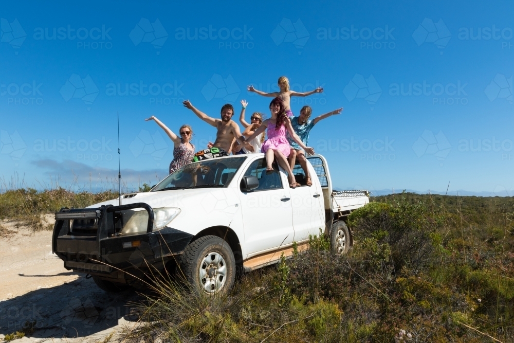 Image of Young people having fun on a four wheel drive trip - Austockphoto