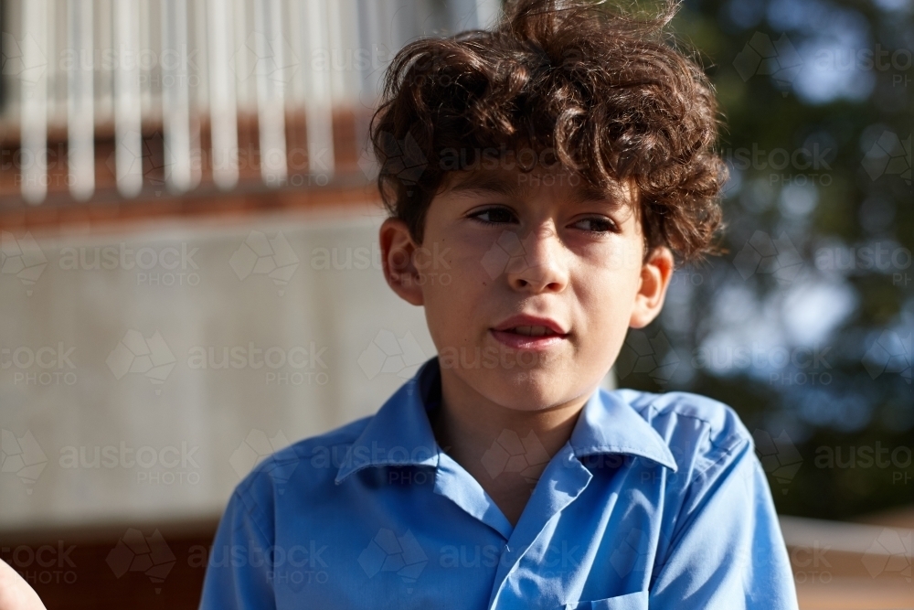 Image of Young school boy at school - Austockphoto