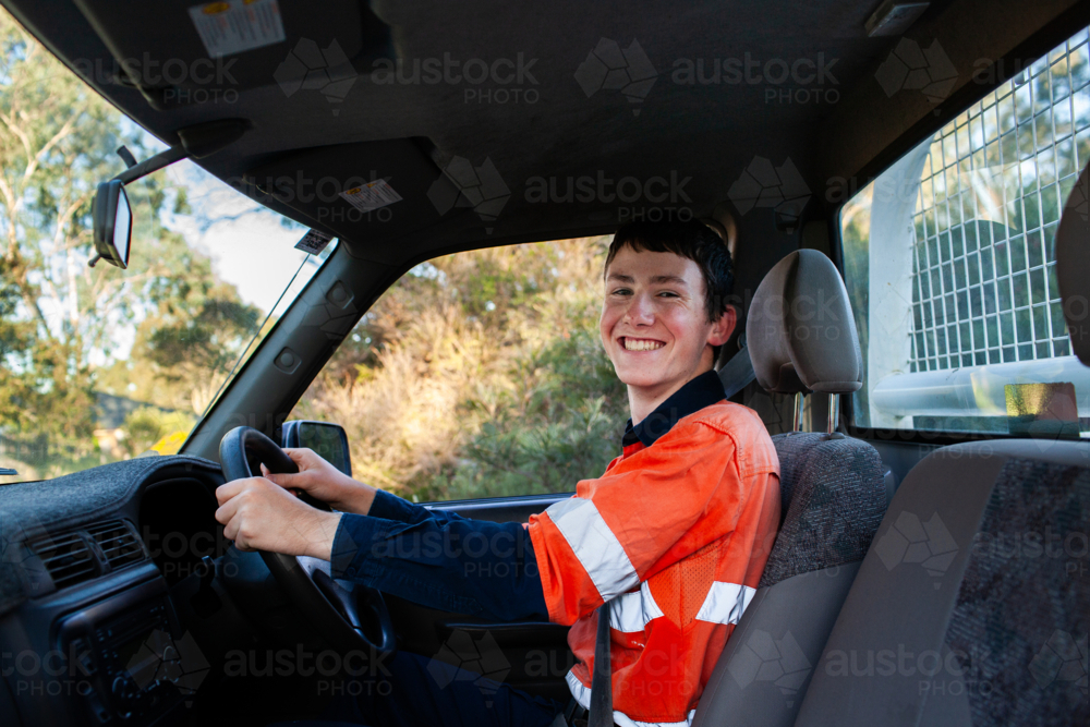 Image of Young teenaged Australian driver driving ute in country ...