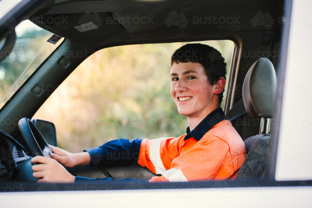 Image of Young teenaged Australian driver driving ute in country ...