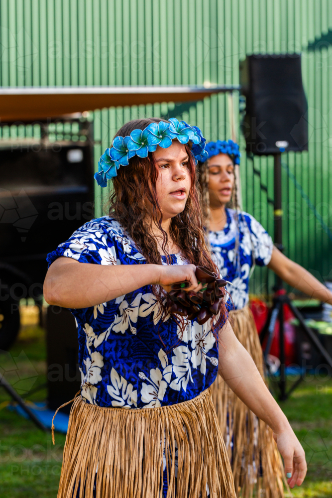 Image of Young Torres Strait Islander teen girl dancing in dance troupe at NAIDOC event ...
